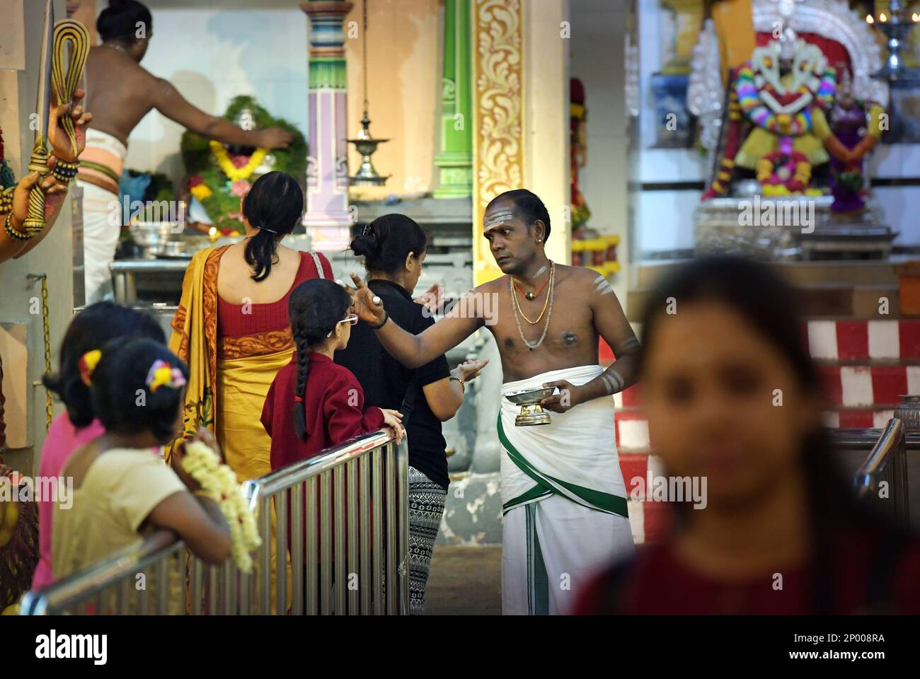 Devotees in the main prayer hall of the temple.Heritage gems story on Sri Mariamman temple ...