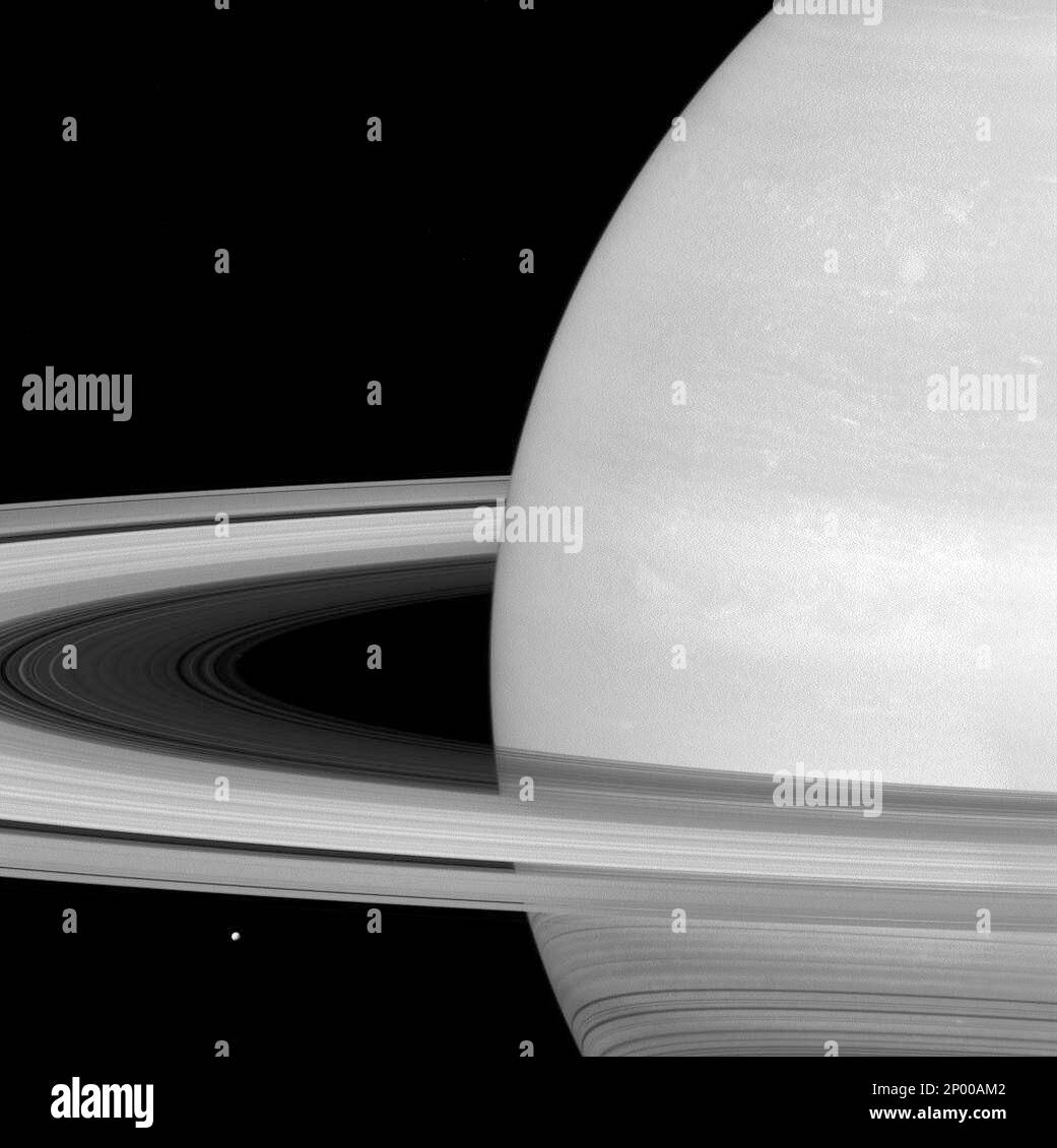 This undated photo made available by NASA shows one of Saturn's moons ...