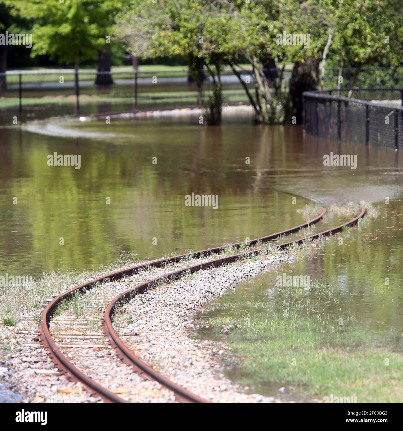 The train tracks for the miniature train at Sunset Park are partially ...