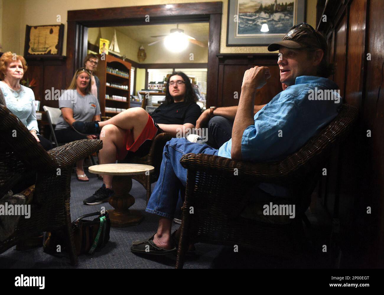 Former NFL player Rusty Hilger, right, talks about Golden Sunrise ...