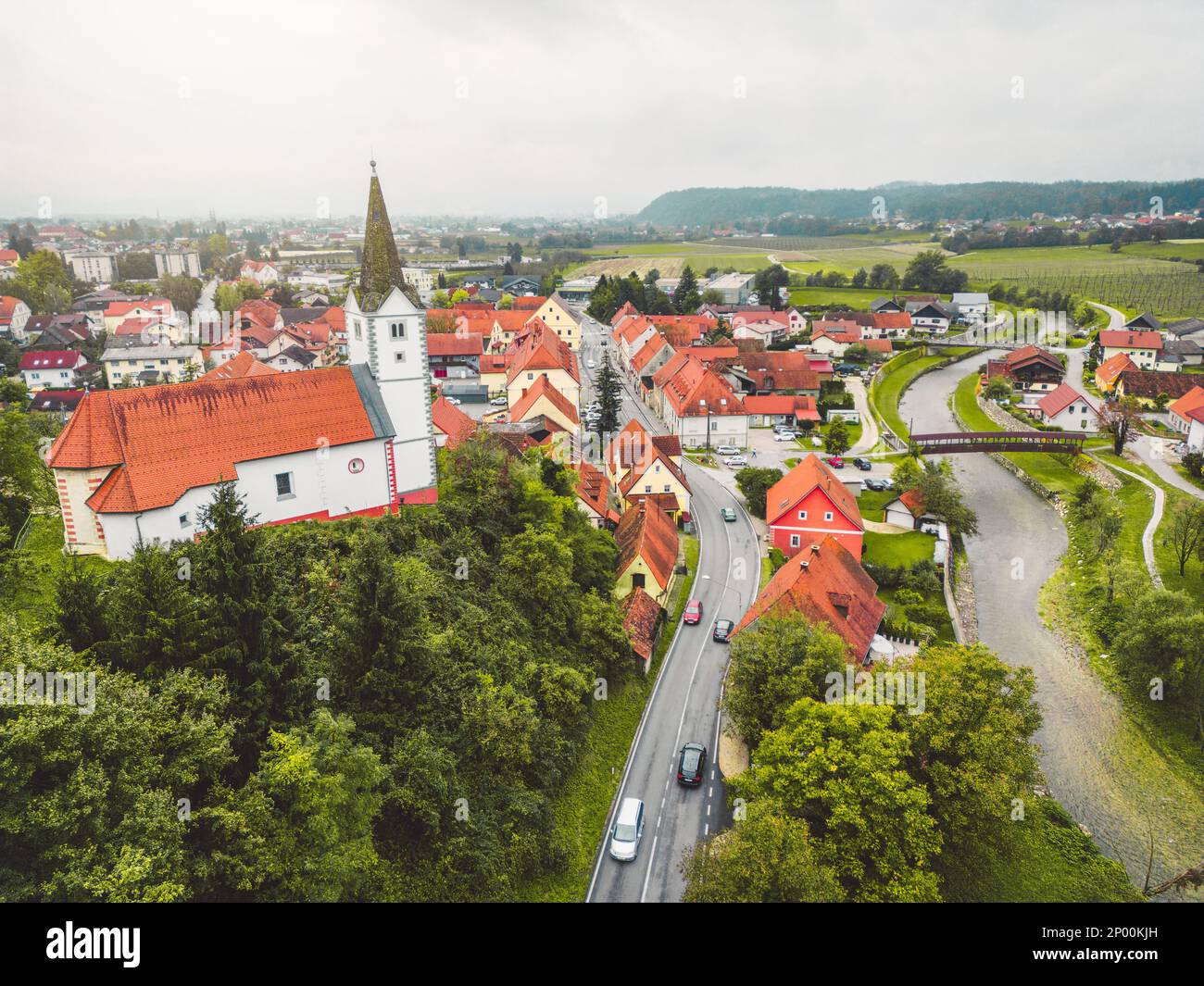 Church on the hill of a small old town, aerial town Stock Photo - Alamy