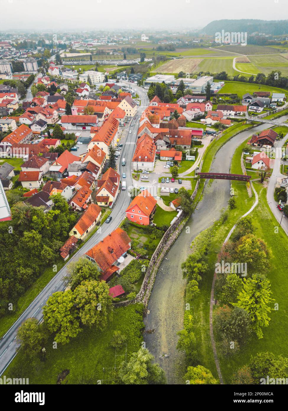 Vertical photo of a small town in the country side, old buildings in ...