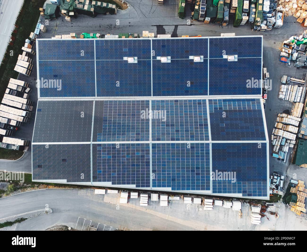 Directly above - Solar panels covering the entire roof of industrial ...