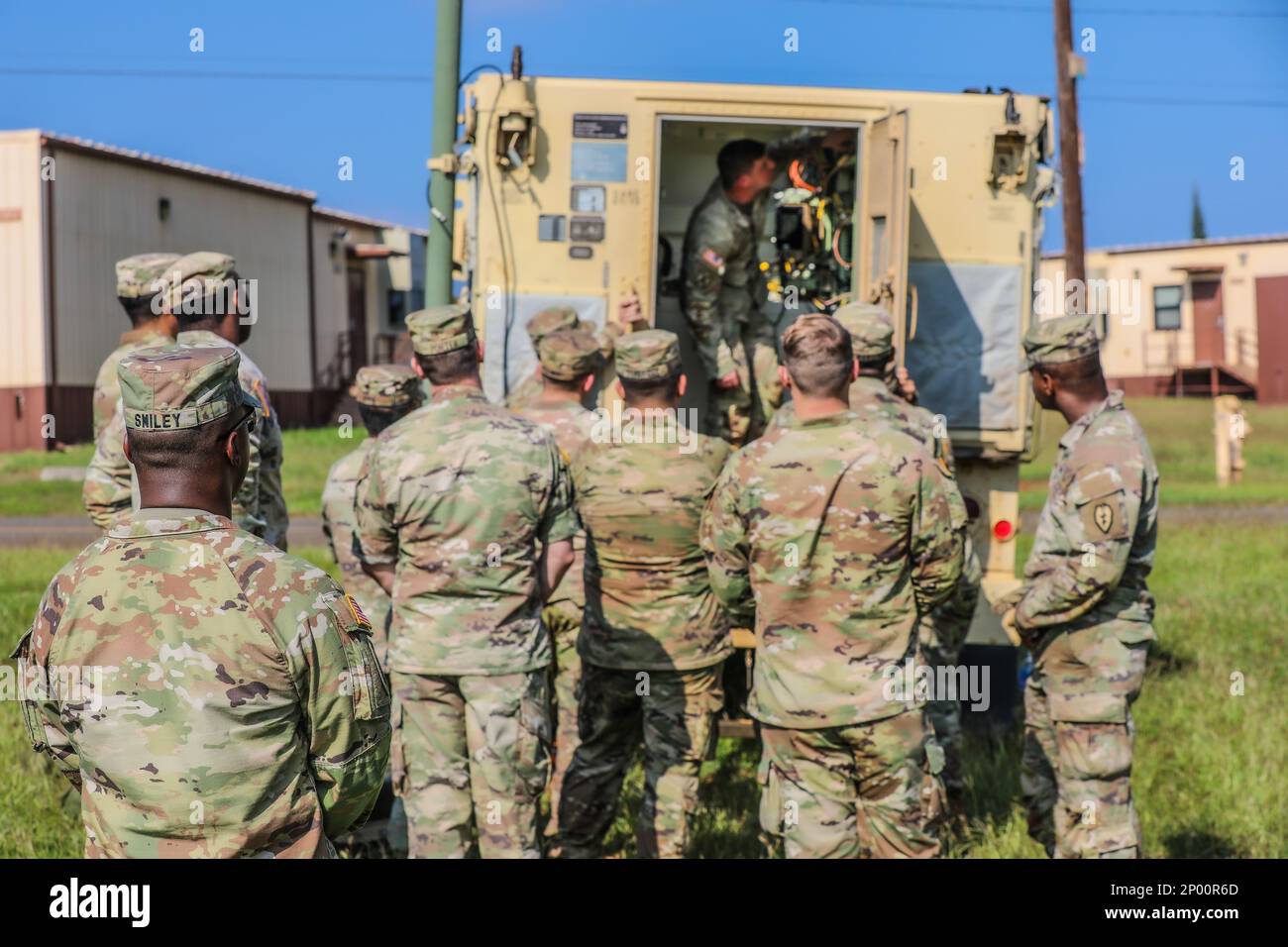 Chief Warrant Officer Two Whitney R. Smiley looks on as the 25th ...