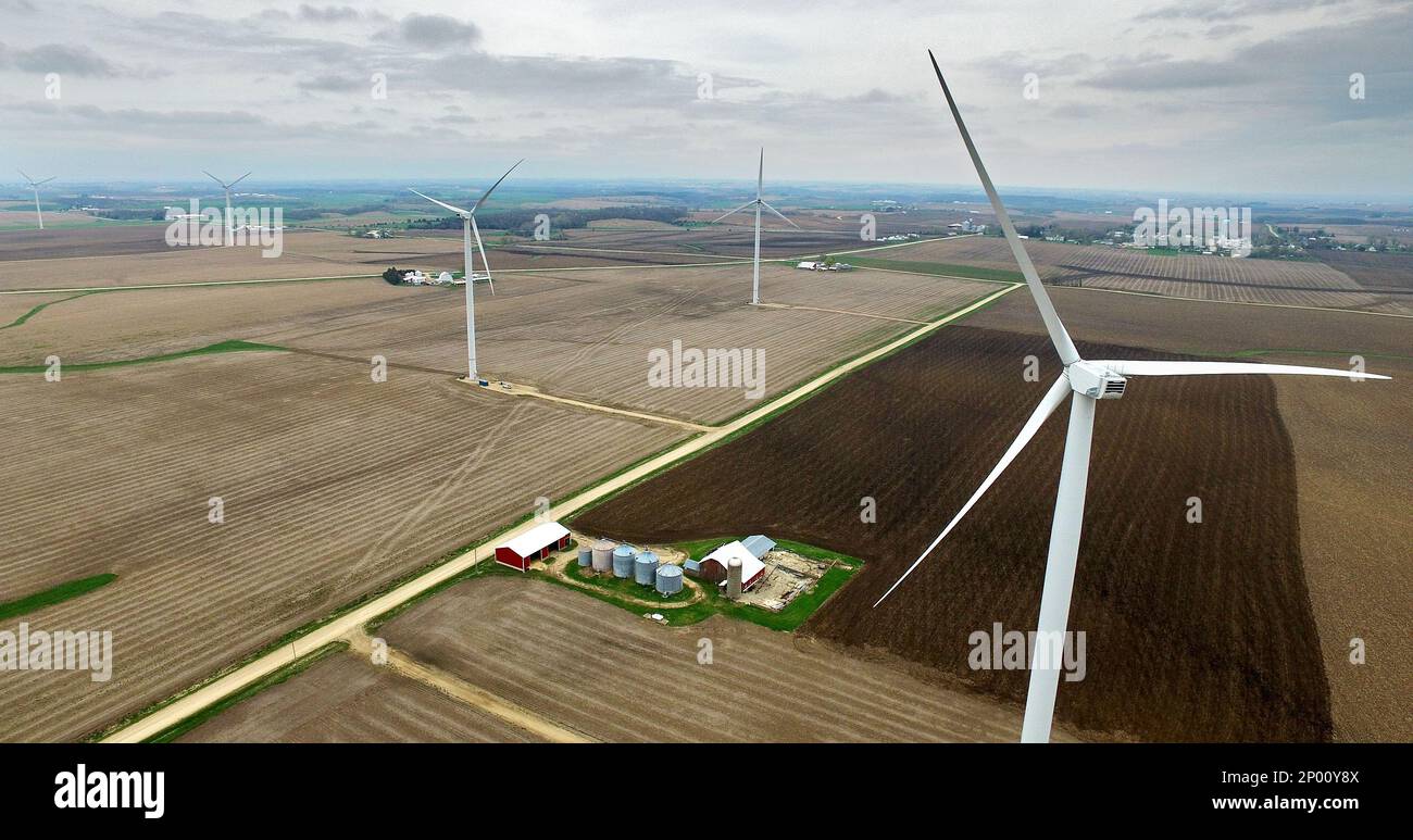 A large windmill towers over a rural farmstead west of Greeley, Iowa ...