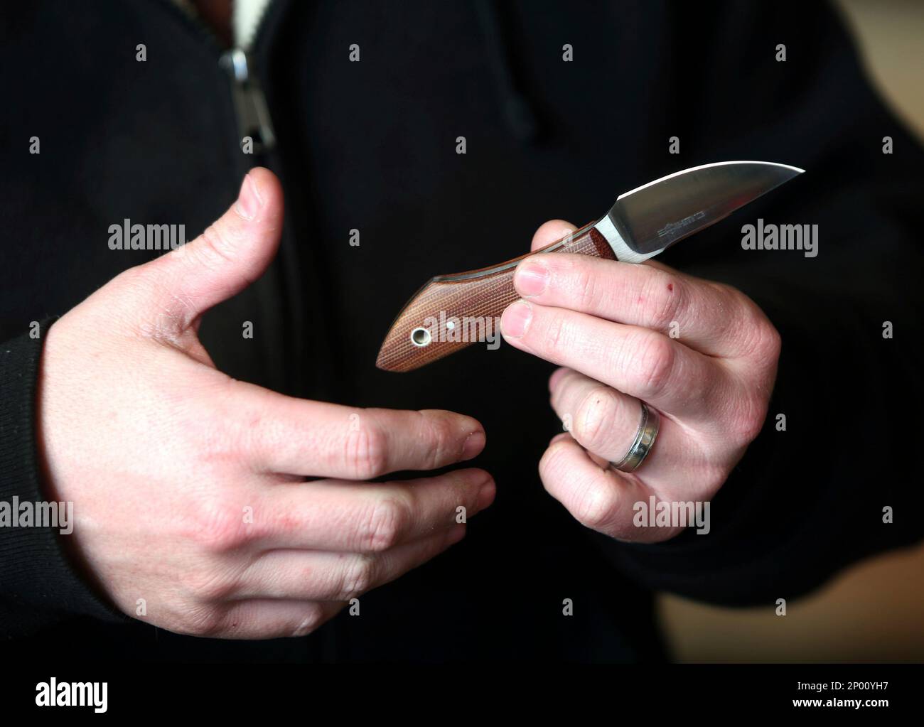 In this March 28, 2017 photo, Hillsboro craftsman and knife maker Caleb ...