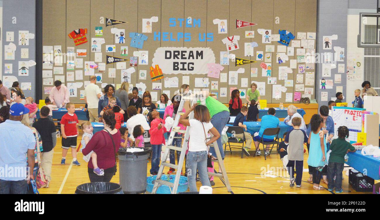 A mural of STEM's motto "Dream Big" is showcased in Lake Hills' gym ...