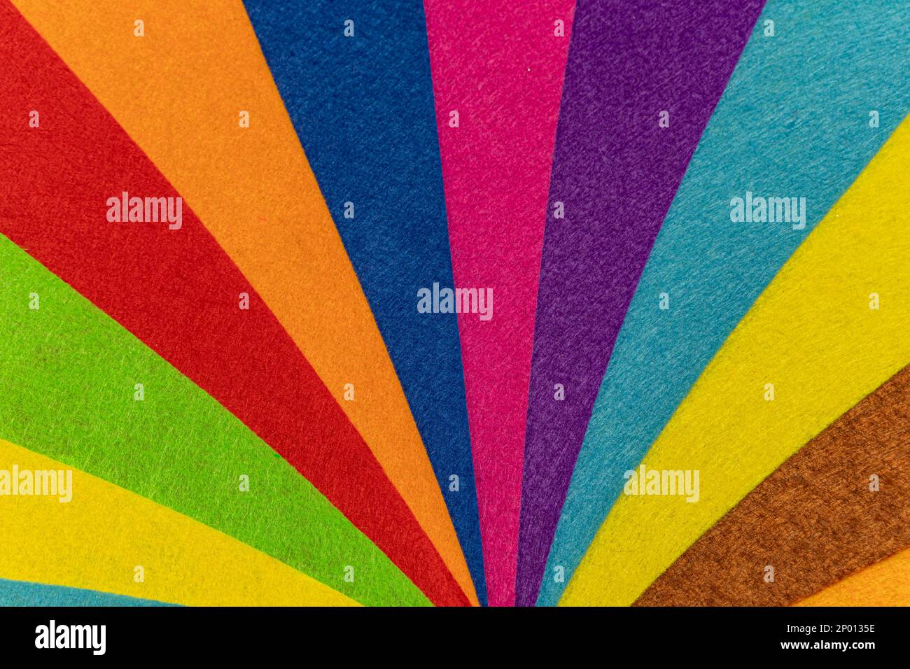 Texture created with overlapping pieces of felt creating a multicolored ...