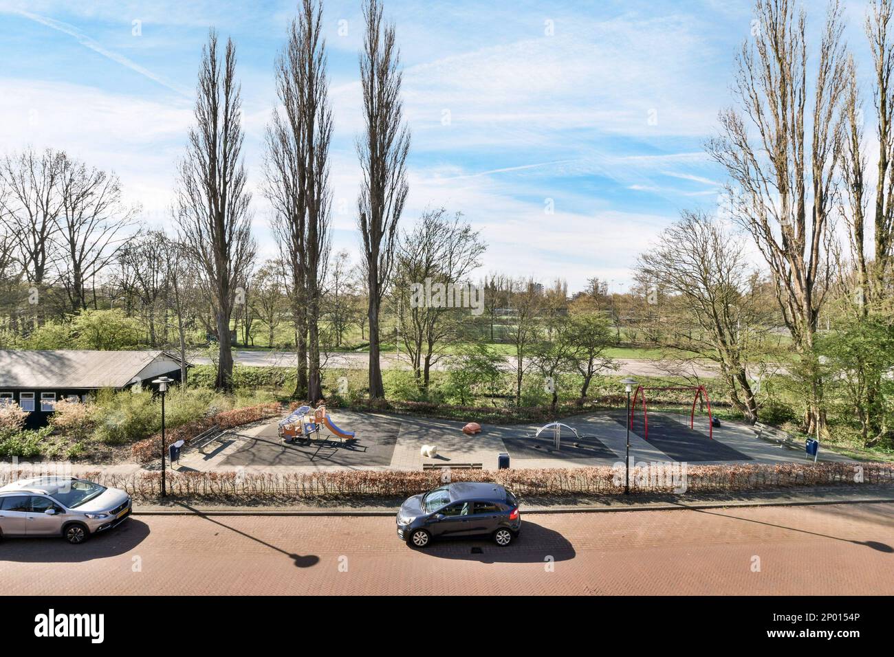 Amsterdam, Netherlands - 10 April, 2021: two cars parked on the side of ...