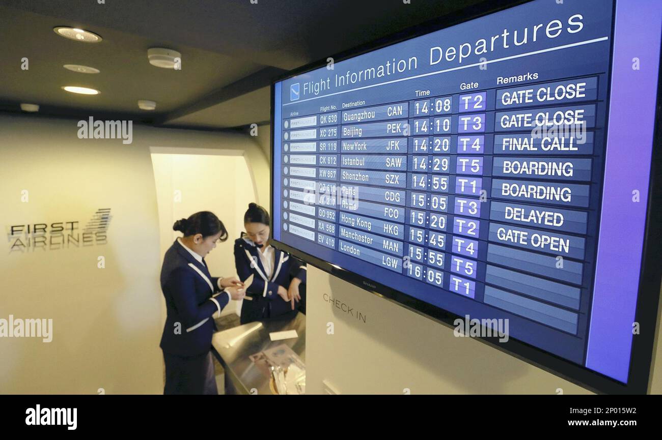 This photo shows an electric departures board of flight information in ...