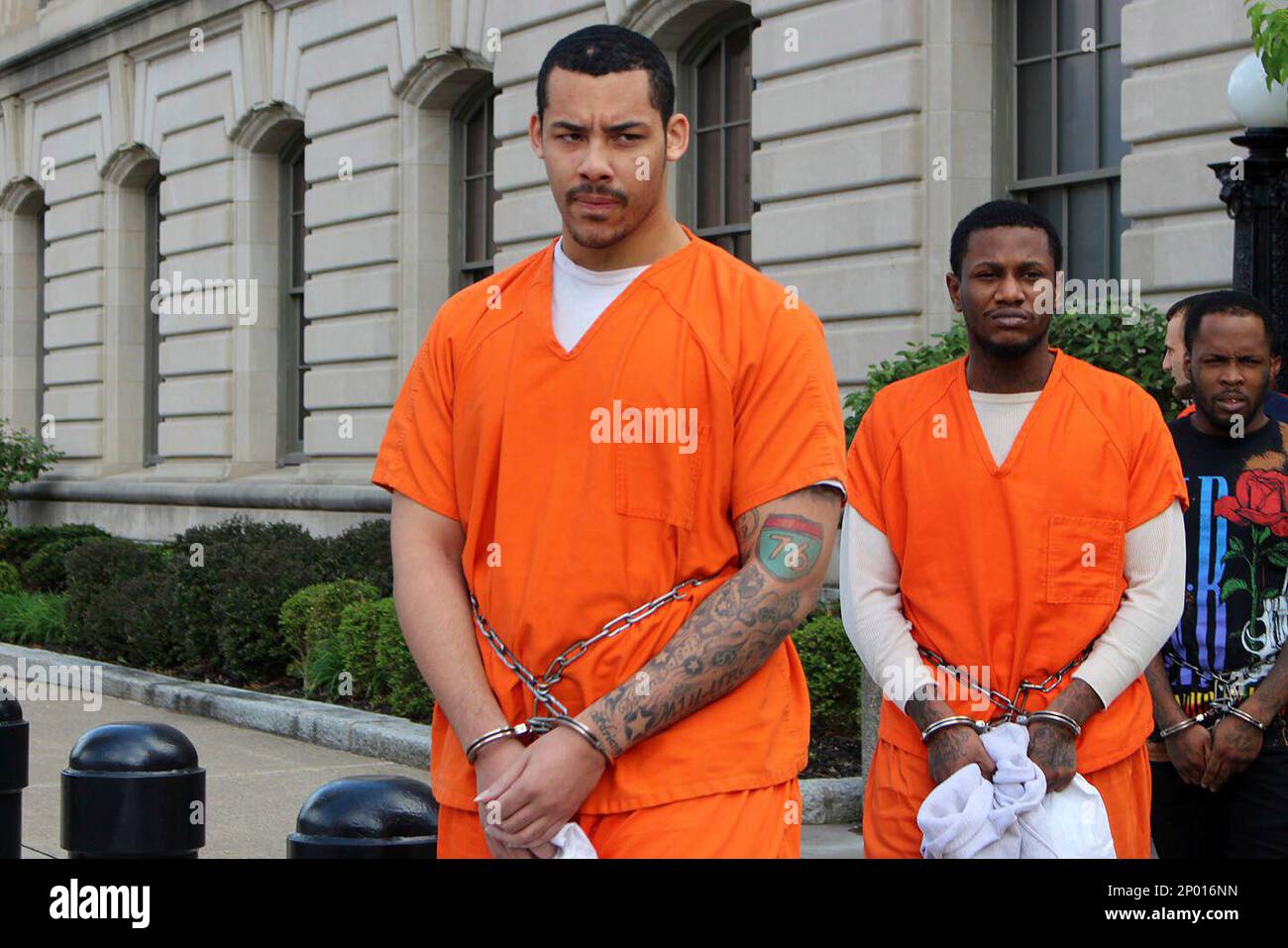 Bruce Lamar Griggs, 22, of Akron, exits a federal courthouse in ...