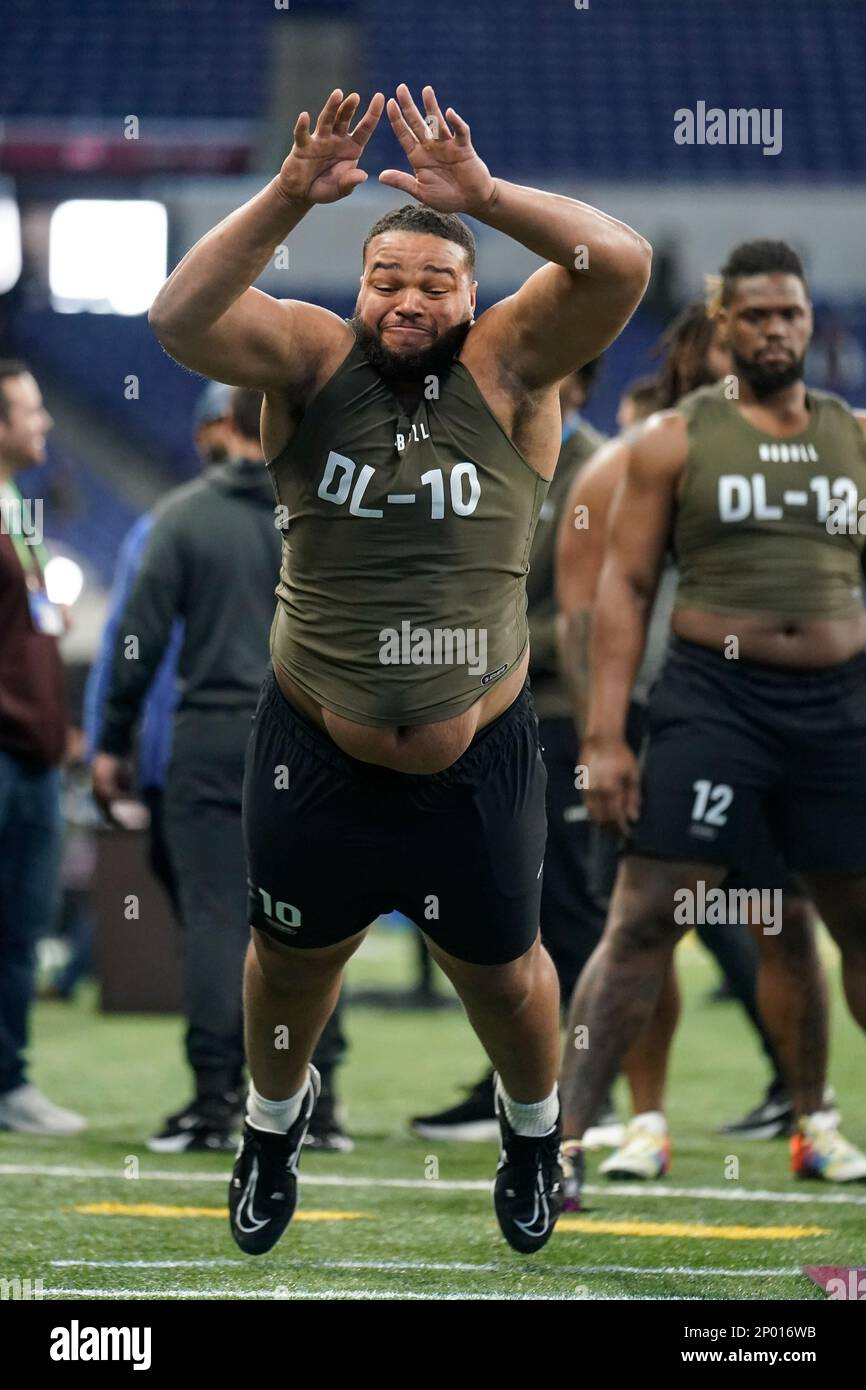 Penn State defensive lineman PJ Mustipher runs a drill at the NFL ...