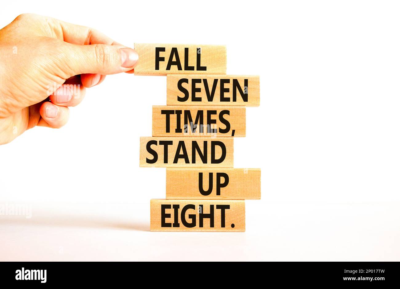 Stand up symbol. Concept words Fall seven times stand up eight on ...