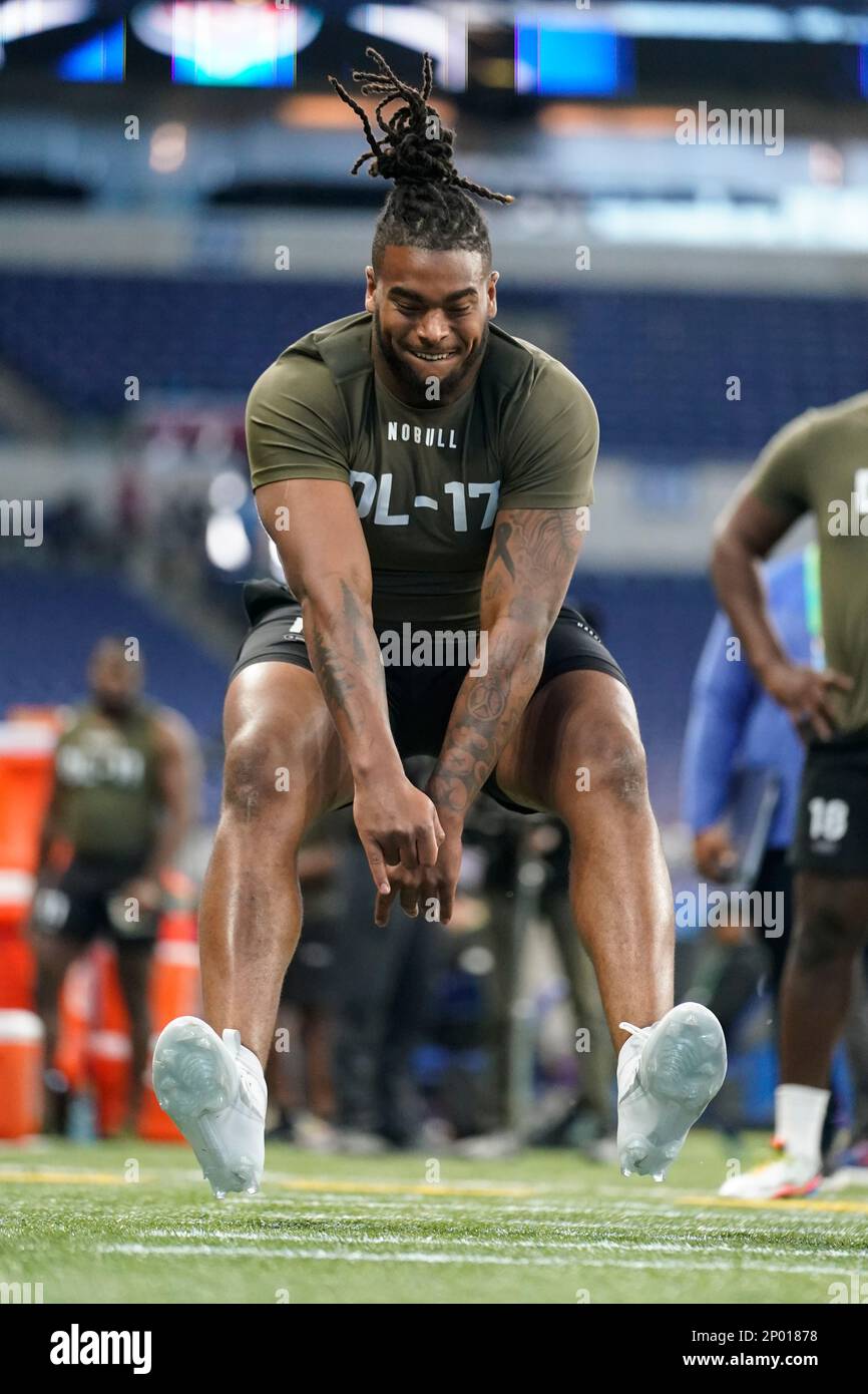 West Virginia defensive lineman Dante Stills runs a drill at the NFL ...