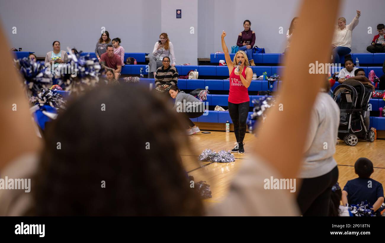 Taylor Filliben, a cheerleader with the Atlanta Falcons, demonstrates a ...