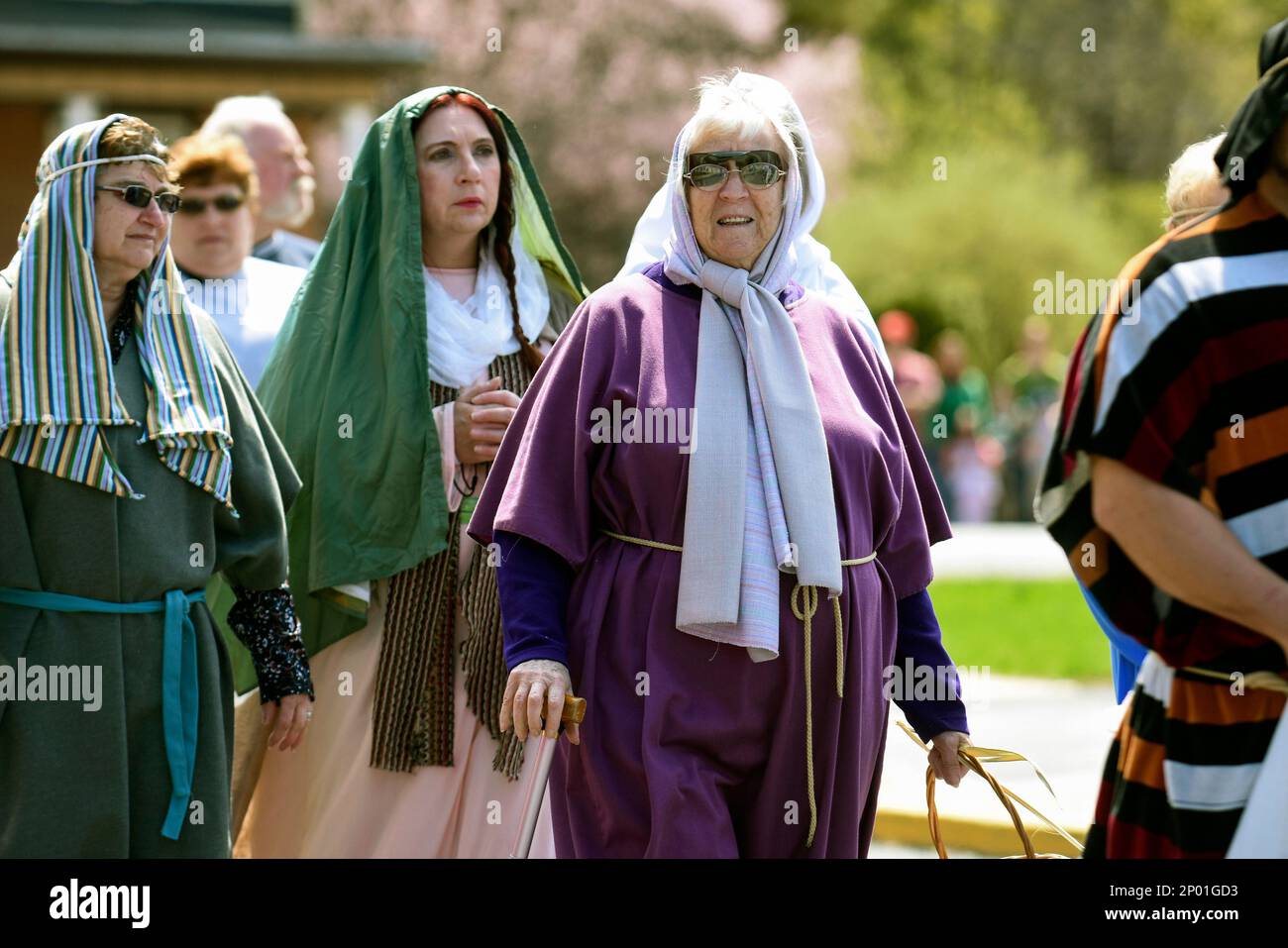 Rose Yost, of Gordon, Pa., walks on the route following the portrayal ...