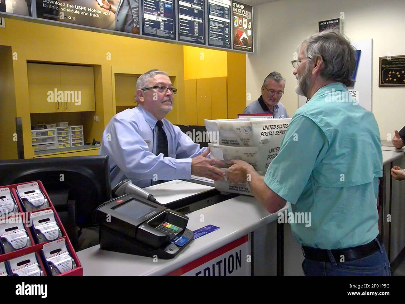 Activist Doug Hughes, right, delivers his protest letters to Congress ...