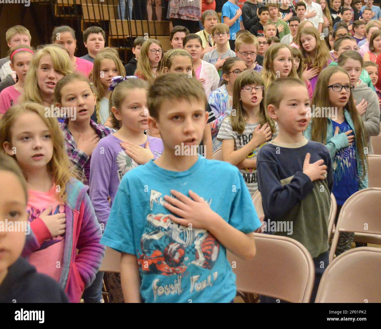 Students in the Weatherly Area School District say the "Pledge of Allegiance" while attending a ...