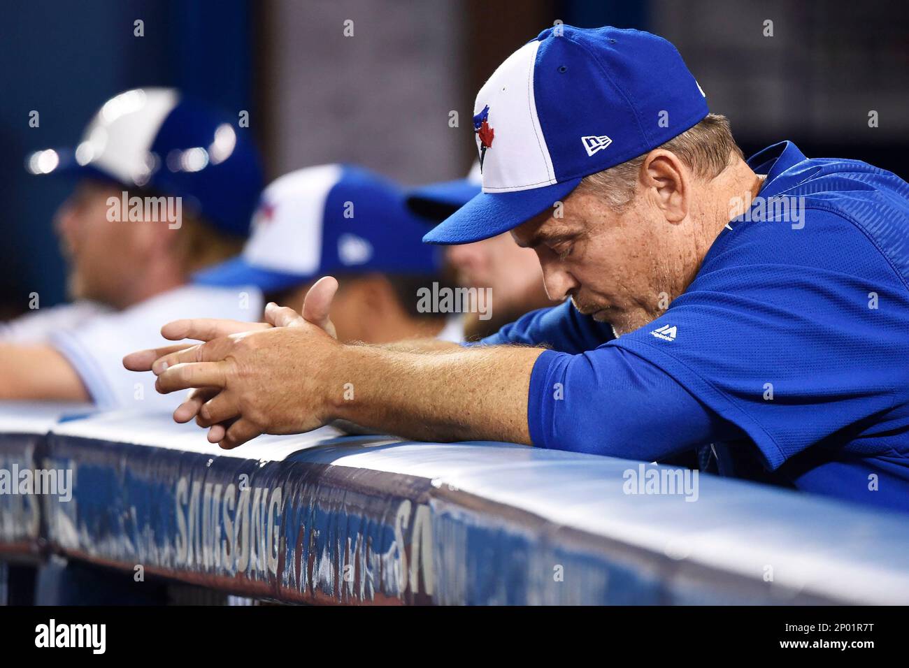Toronto Blue Jays manager John Gibbons stands in the dugout during the ...