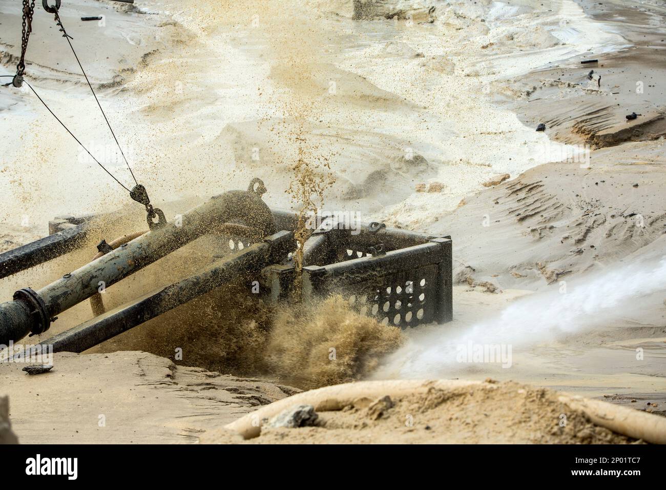In this Tuesday, March 28, 2017 photo, sand is pushed into an intake ...