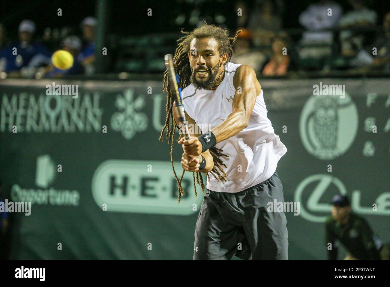 HOUSTON, TX - APRIL 10: Dustin Brown of Germany hits a backhand during ...