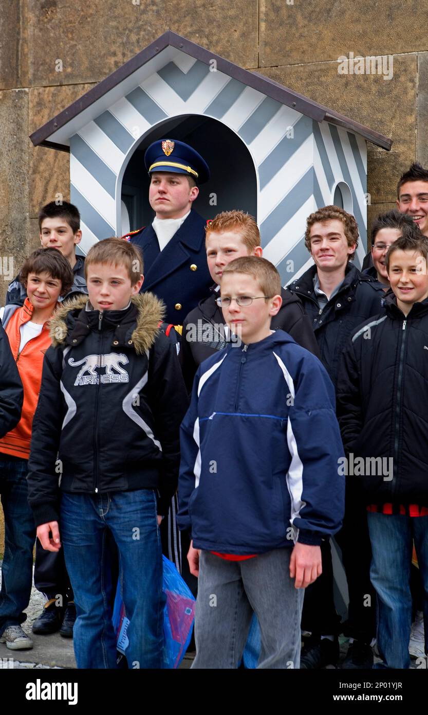Guard and tourists children at the main gate. Prague Castle.Prague ...