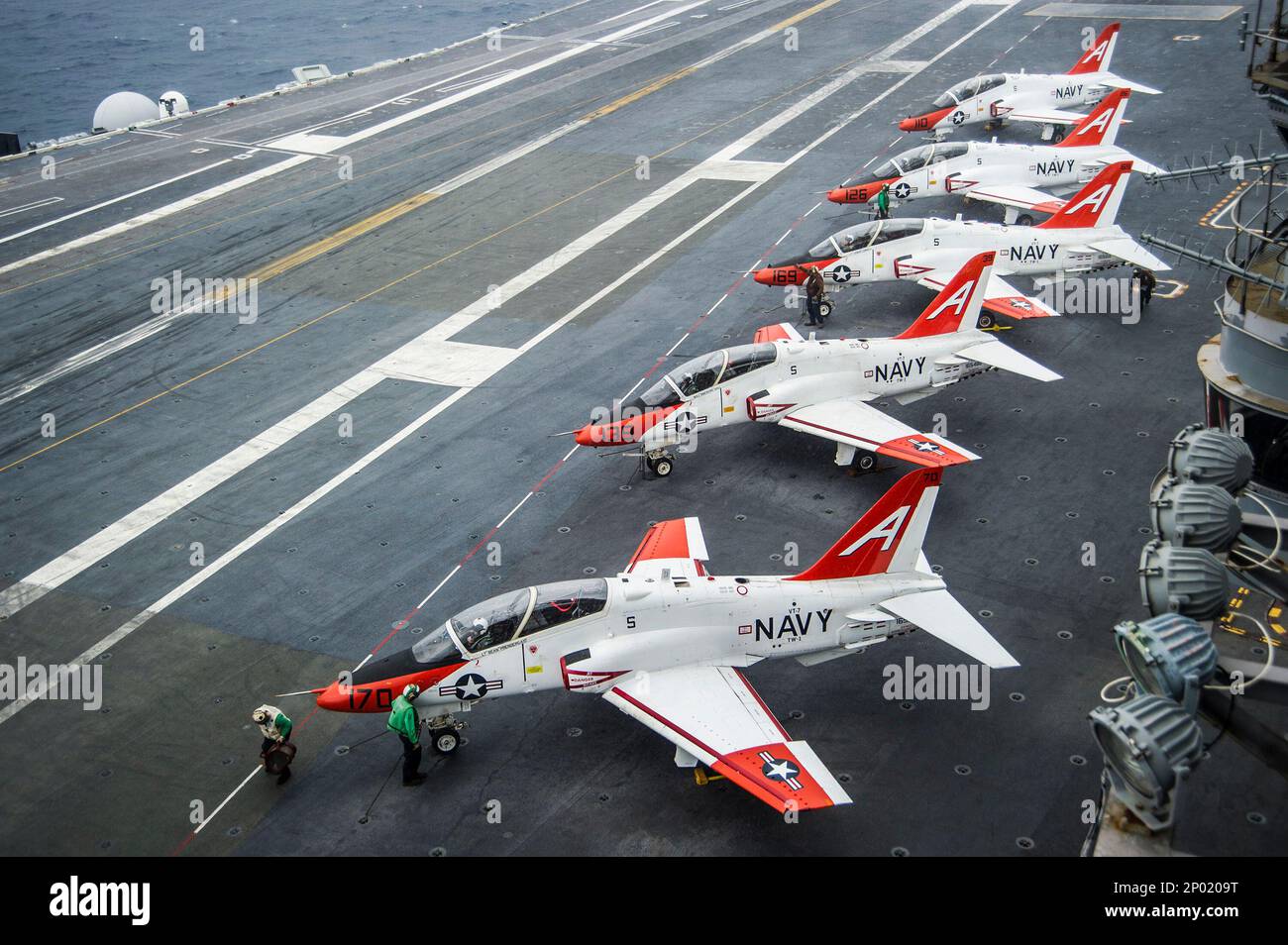 In this Dec. 10, 2016 photo, pilots perform pre-flight procedures in T ...