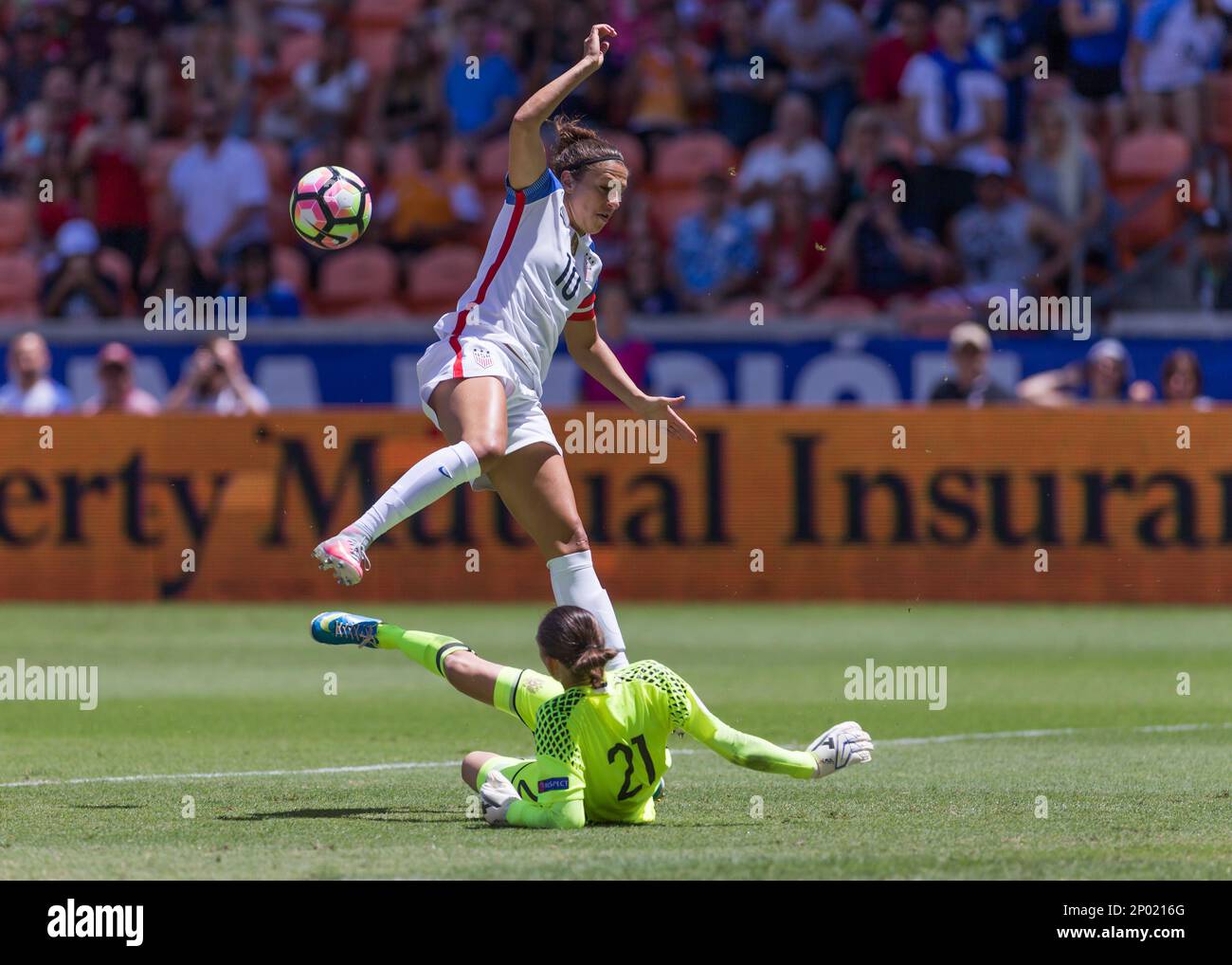 HOUSTON, TX - APRIL 09: Carli Lloyd (10) midfielder of U.S. leaps over ...