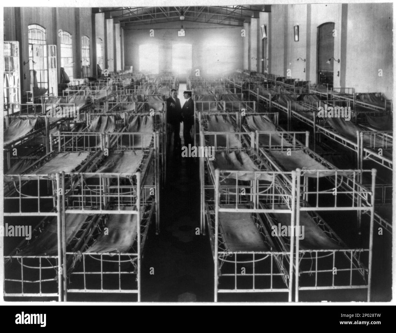 Double decker cots lined up in Immigrant Hotel, Buenos Aires, Argentina ...