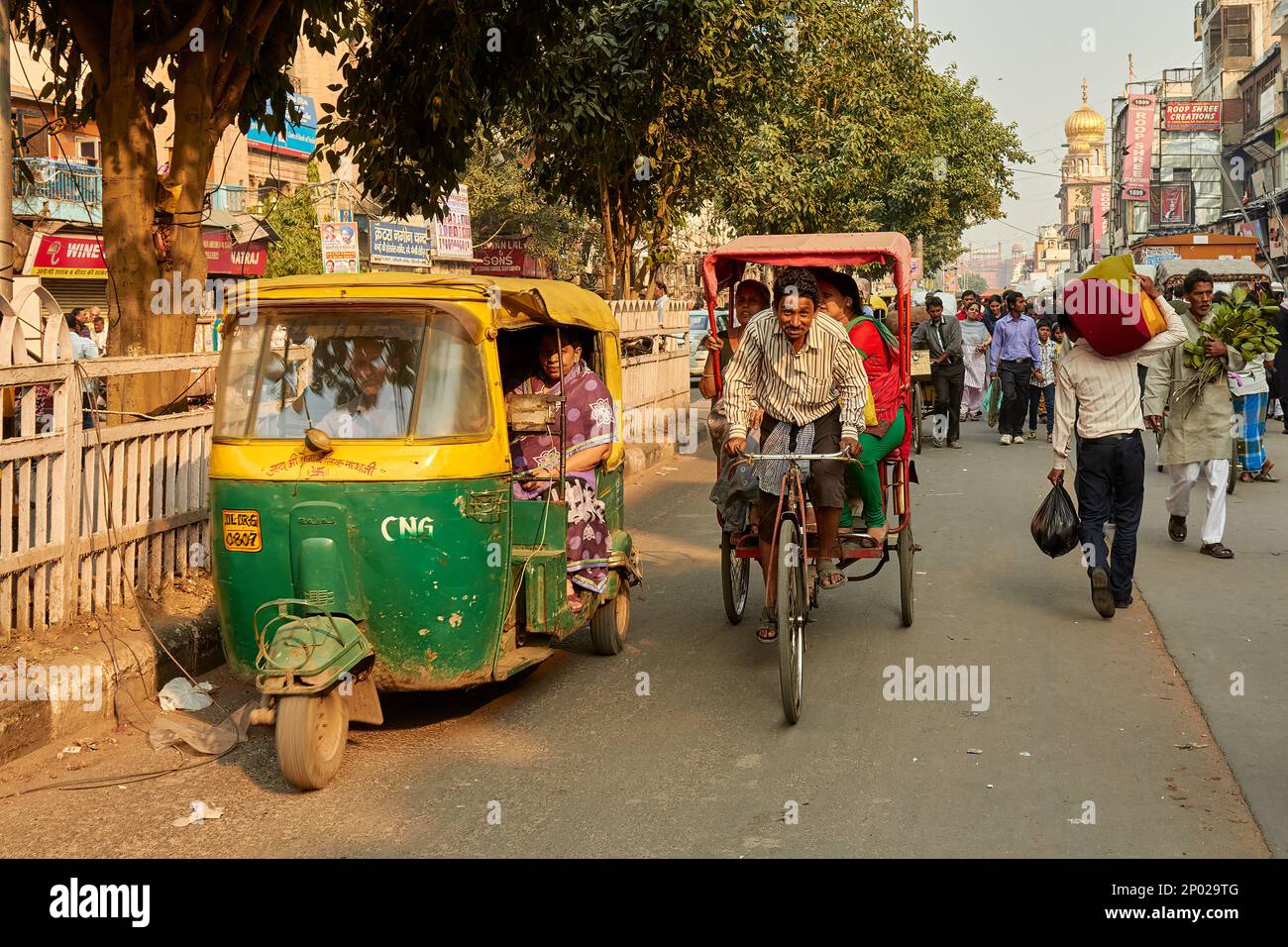 Auto Rickshaw and Bicycle Rickshaw drivers with passengers in Chandni ...
