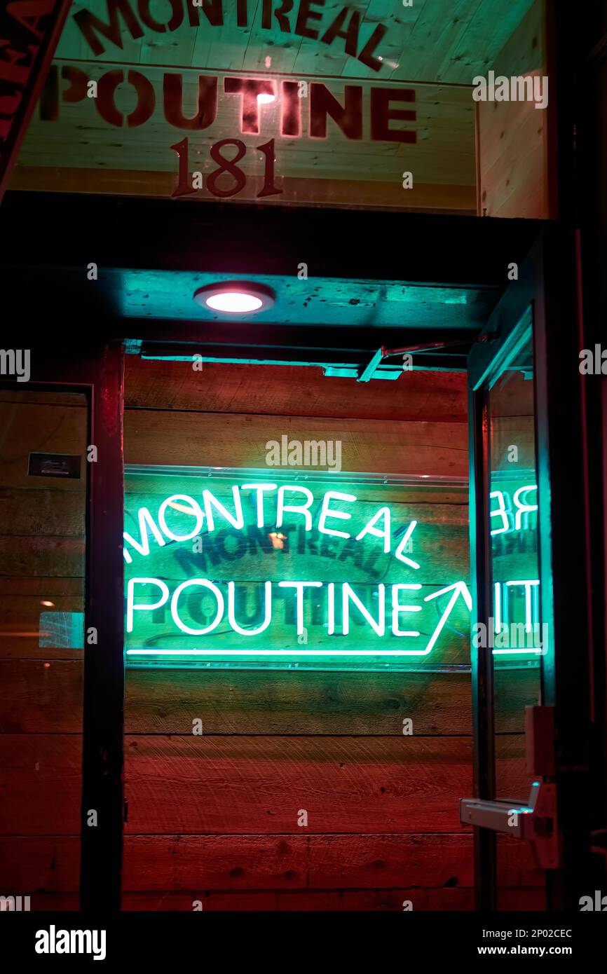 Neon poutine restaurant sign in Montreal, Quebec, Canada Stock Photo ...