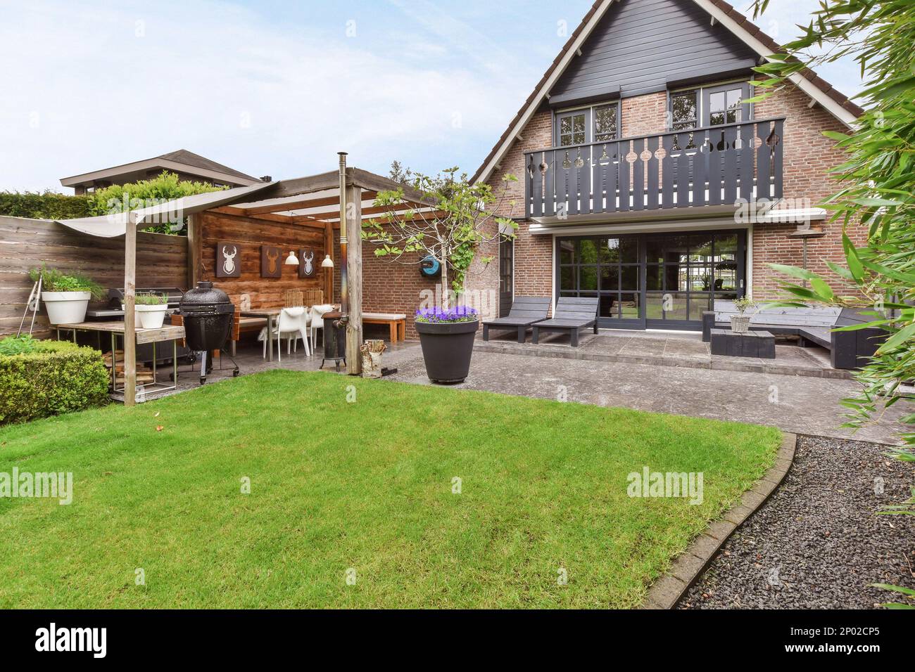 Amsterdam, Netherlands - 10 April, 2021: a backyard area with a patio ...