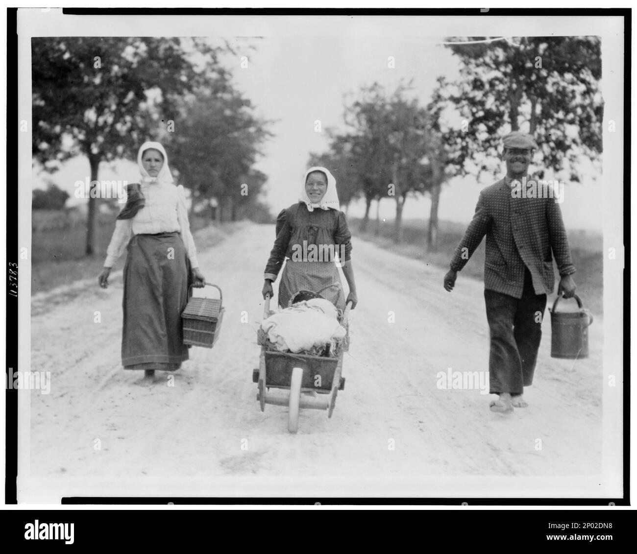Three peasants walking to market, Hungary. Frank and Frances Carpenter ...