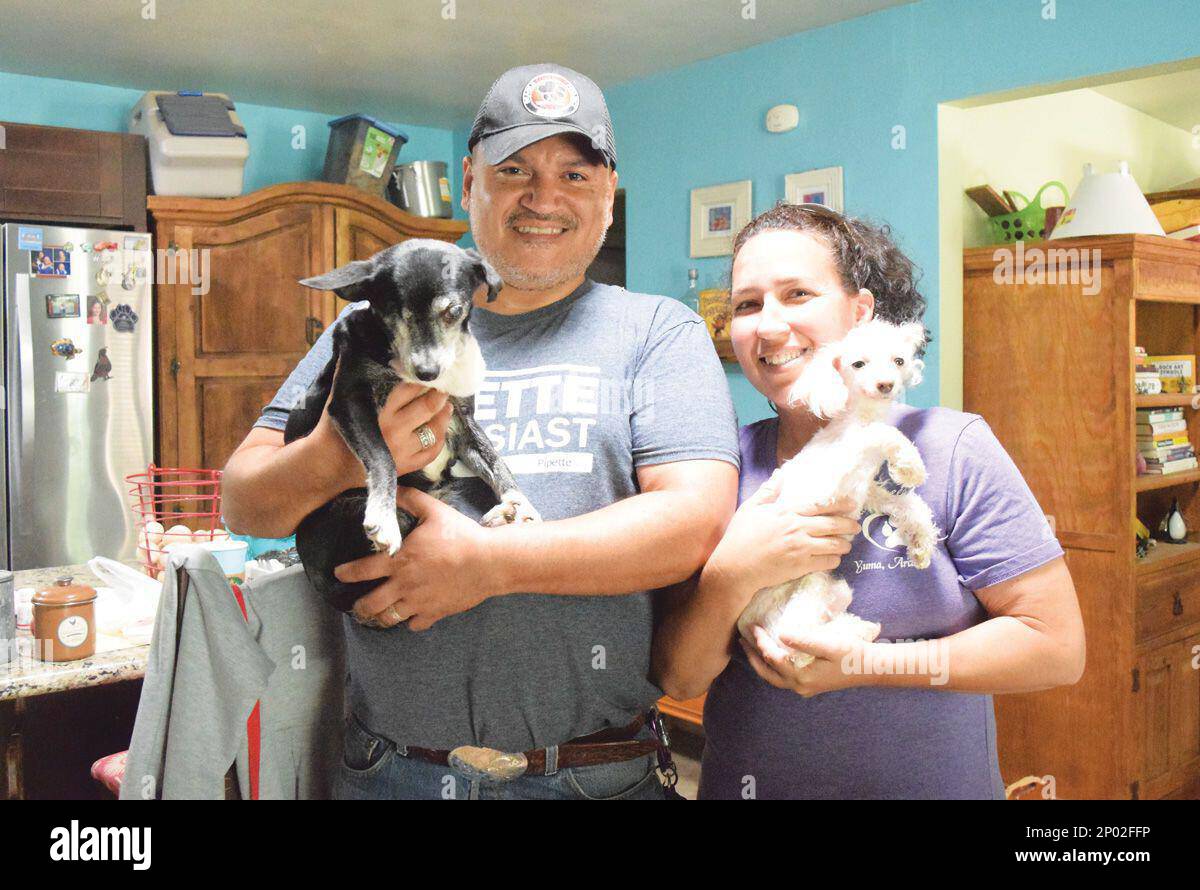 Paula Rivadeneira, right, holds Chula, who is quadriplegic and cannot ...