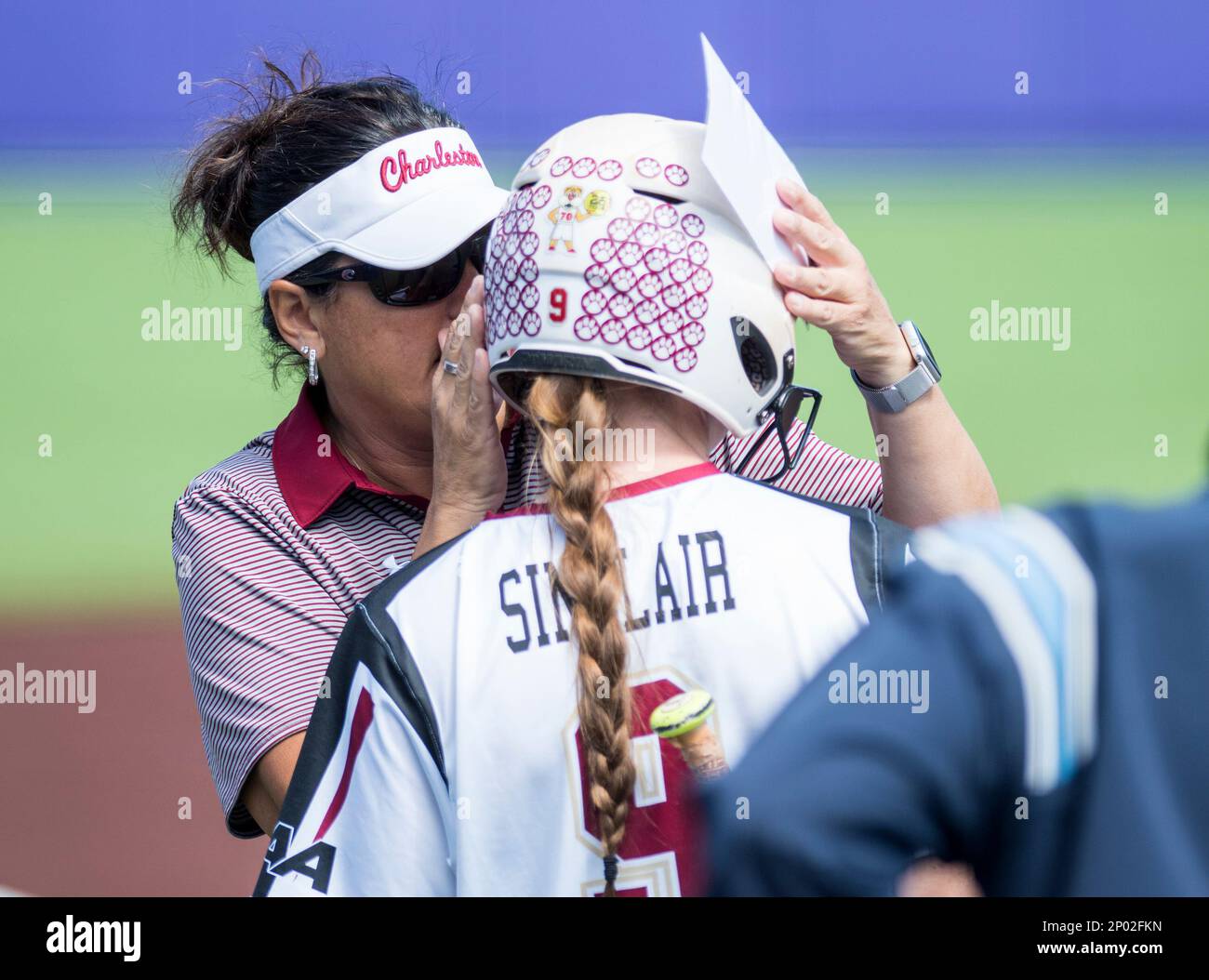 Charleston head coach Linda Kalafatis directs Kelly Sinclair before she ...