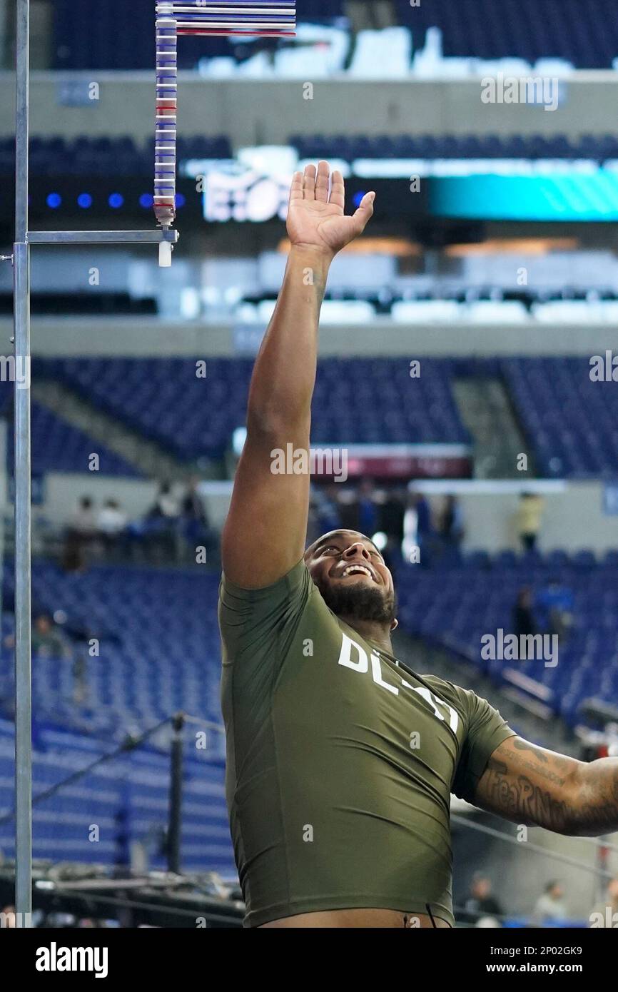 West Virginia defensive lineman Dante Stills runs a drill at the NFL ...
