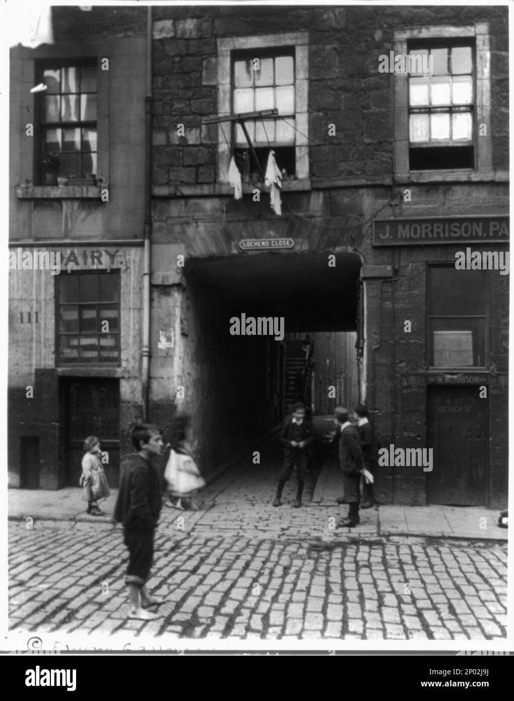 Six children at Lochend Close in old section of Edinburgh, Scotland ...