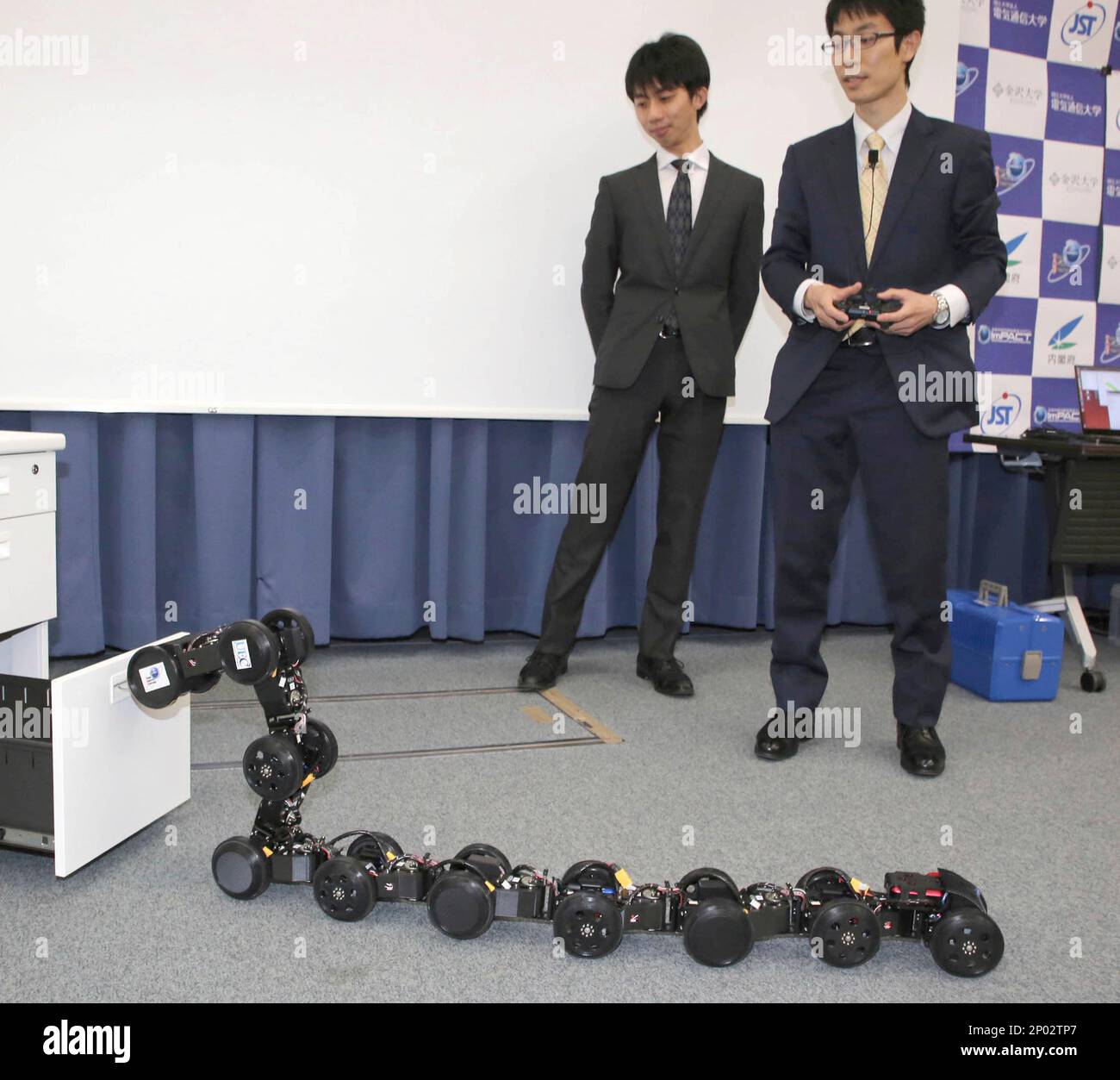 T2 Snake-3 robot, operated by wireless remote control, wiggles on the ...