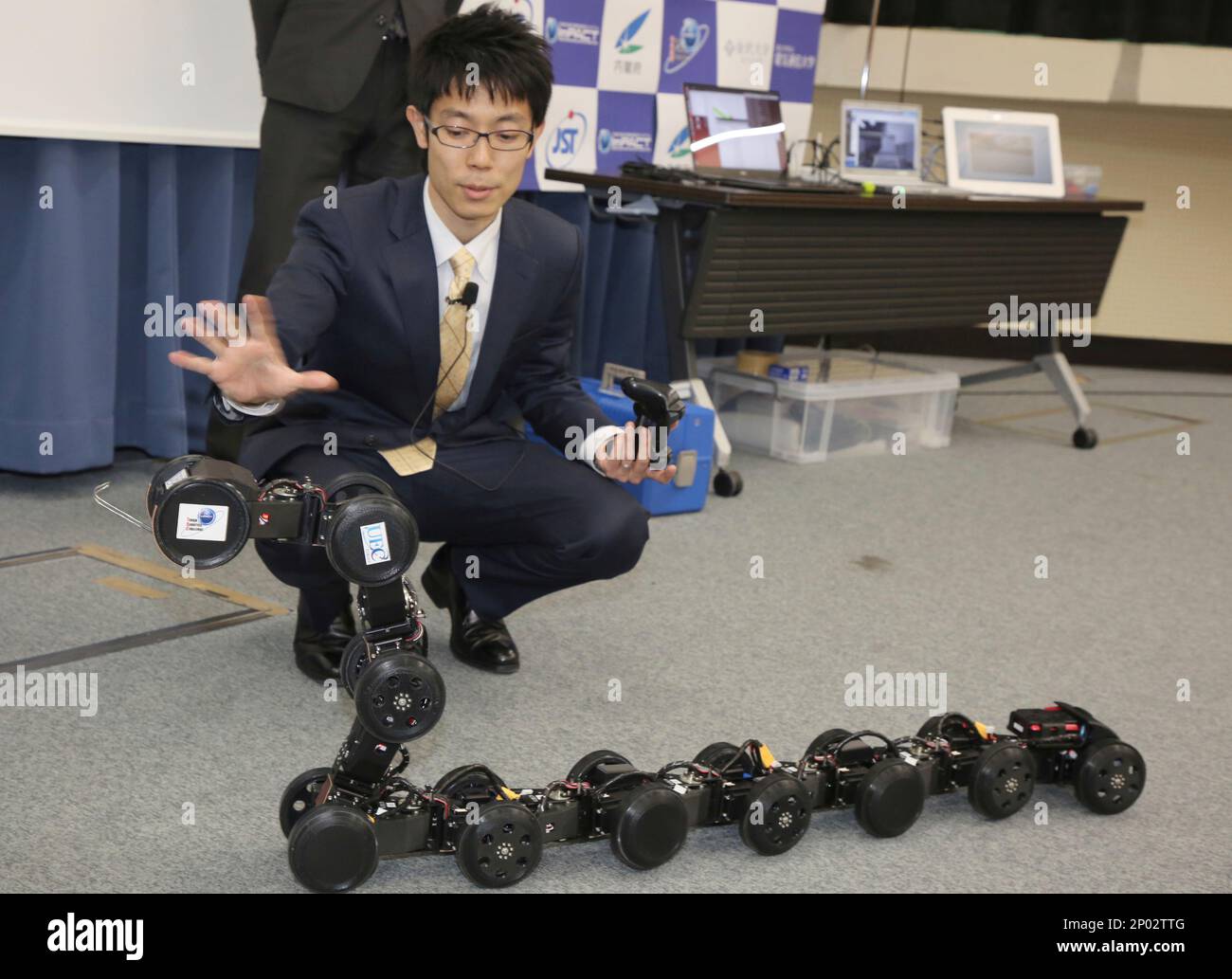 T2 Snake-3 robot, operated by wireless remote control, wiggles on the ...