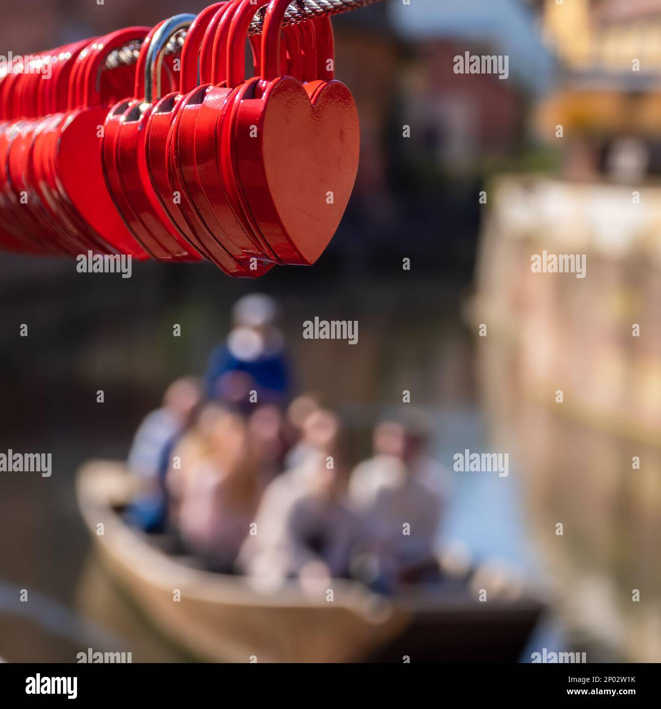 Red heart-shaped locks on a fence along the Lauch River in Colmar Stock ...