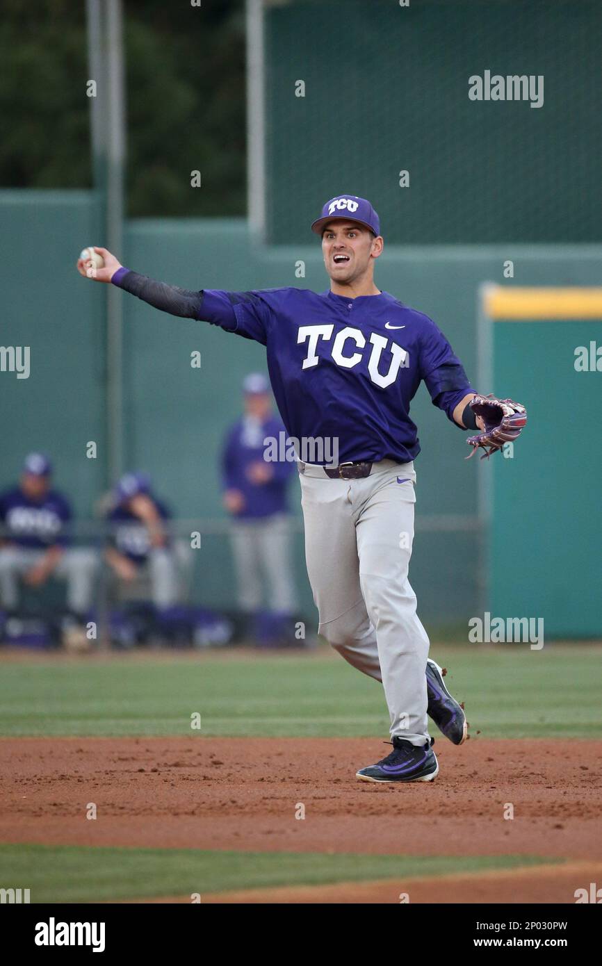 Elliott Barzilli (3) of the TCU Horned Toads throws to first base ...