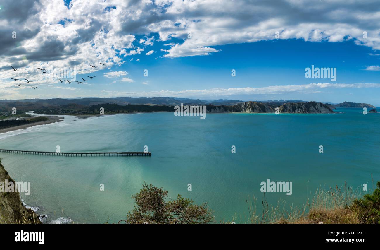 Overlooking the historic Tolaga Bay wharf from the Captain Cook walkway ...