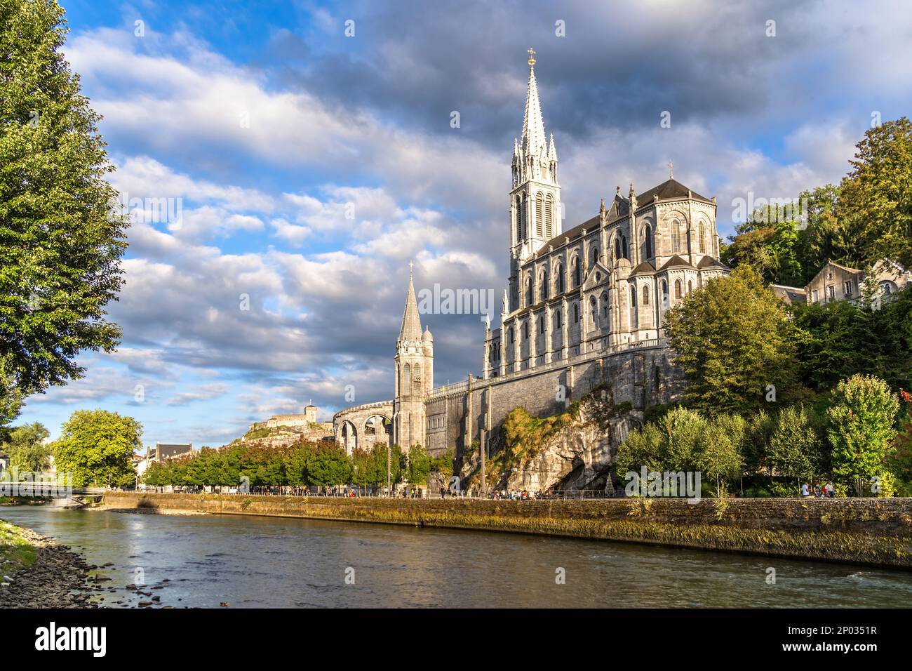 Pilgrimage basilica of Holy Rosary above the grotto in Lourdes Stock ...
