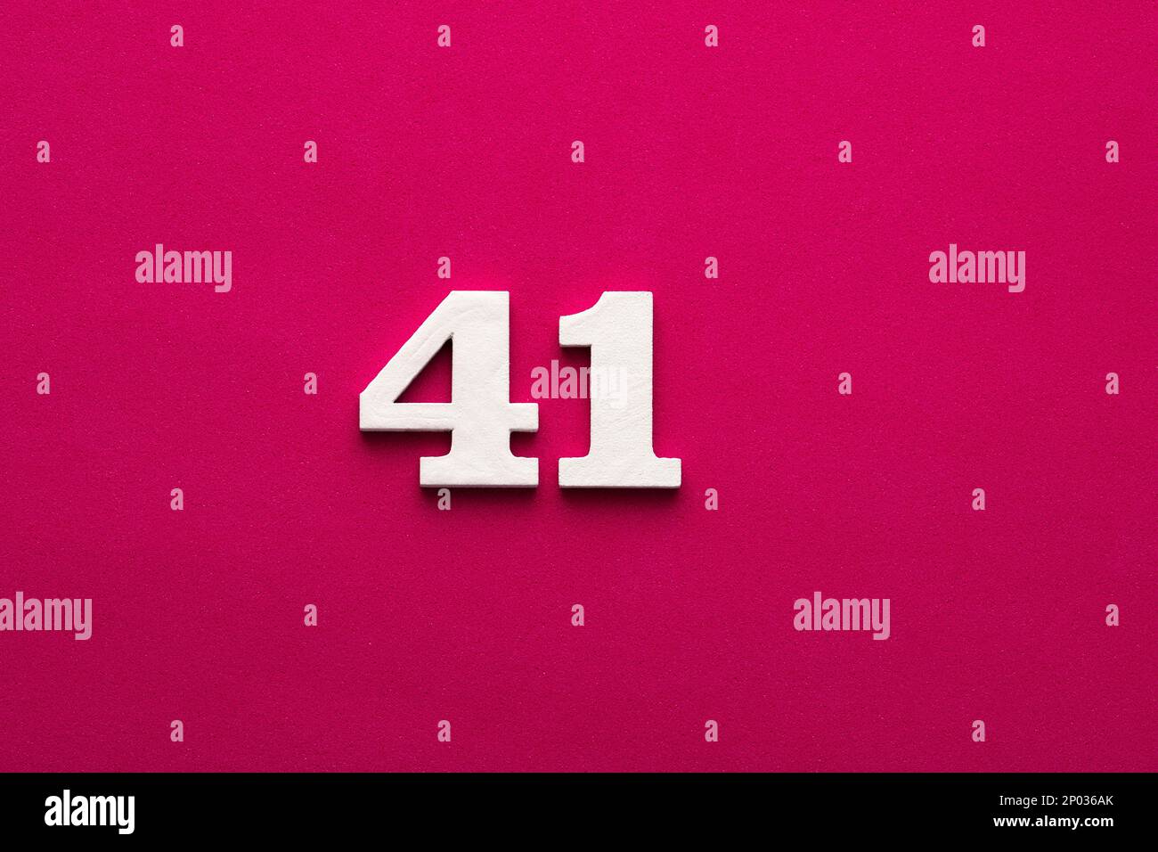 Number 41 - white number in wood on rhodamine red background Stock ...