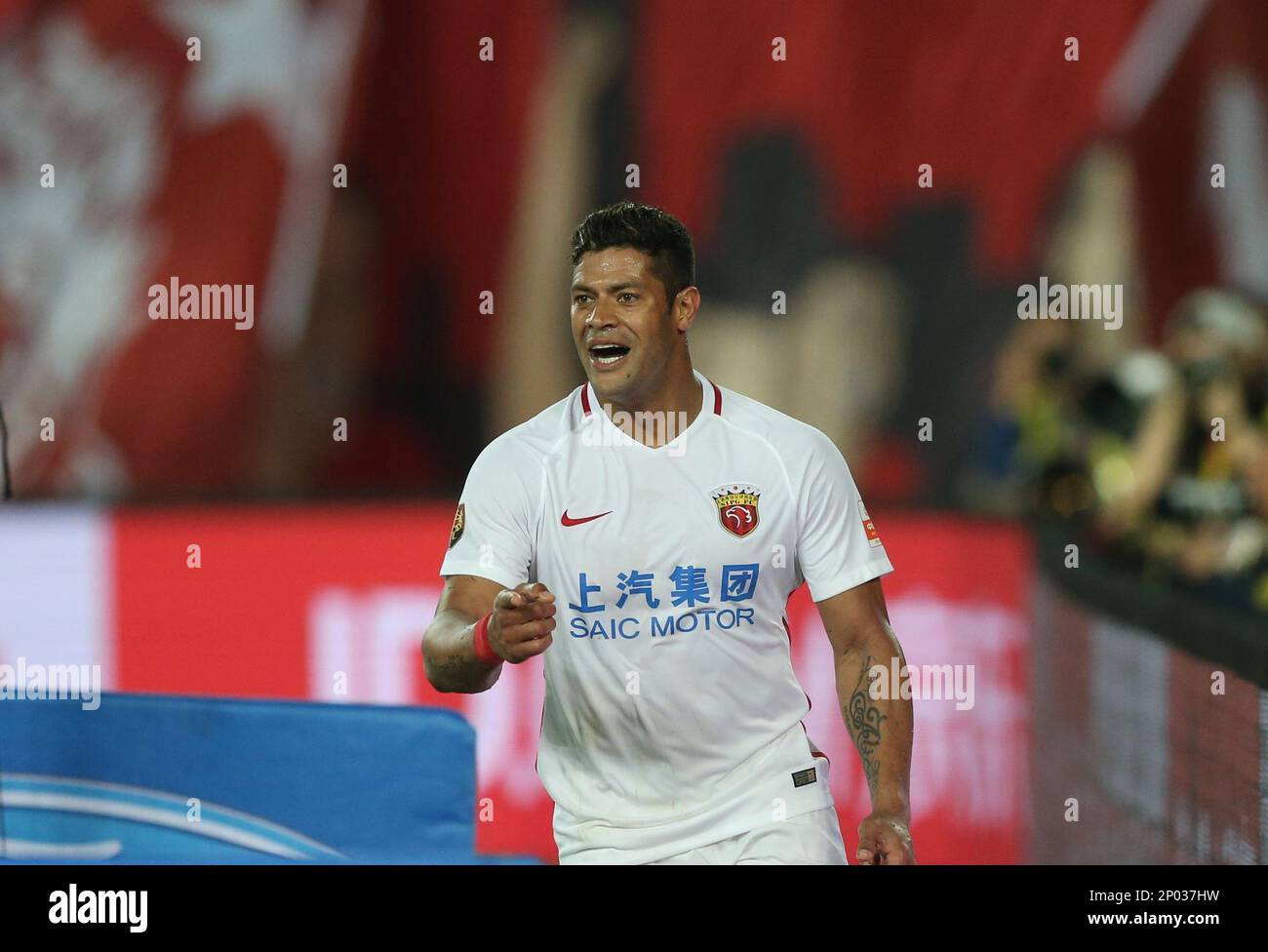 Shanghai SIPG's Hulk celebrates for a goal against Guangzhou Evergrande ...