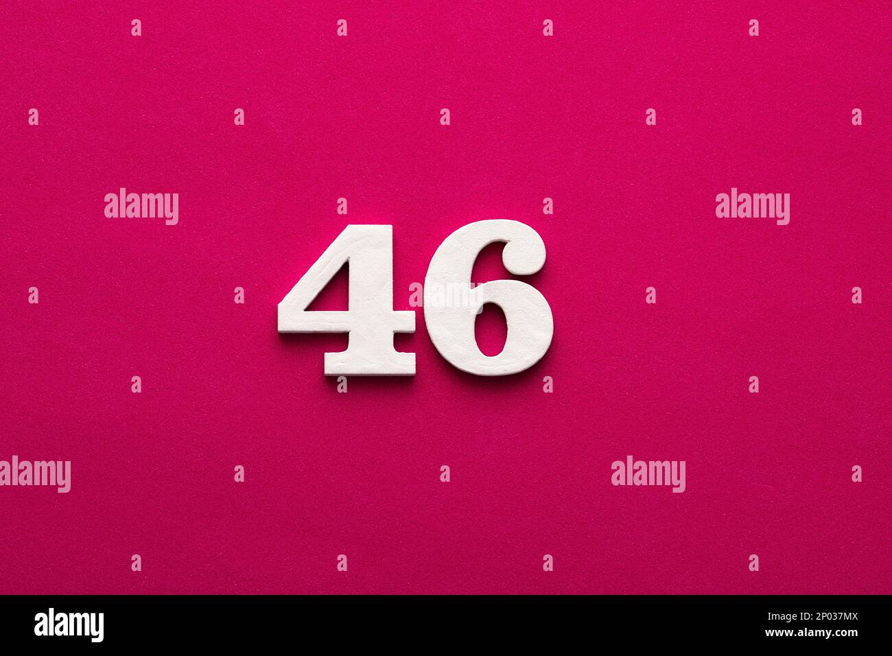 Number 46 - White wooden number on rhodamine red background Stock Photo ...