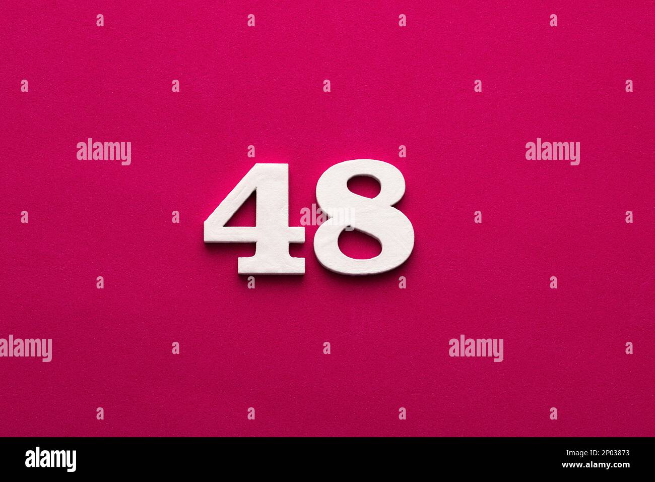 Number 48 - White wooden number on rhodamine red background Stock Photo ...