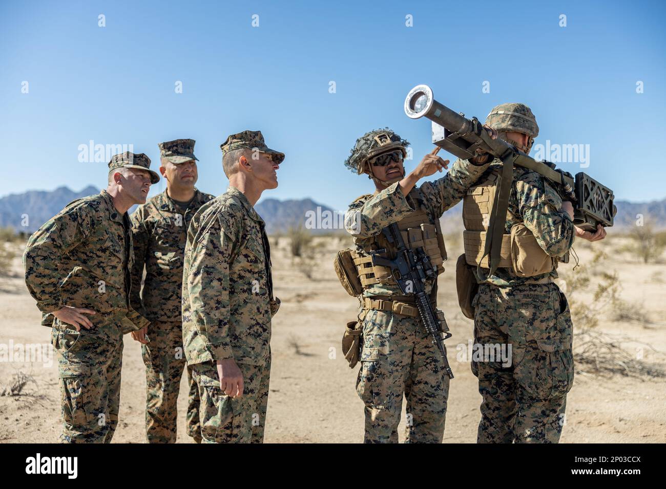 U.S. Marine Corps Col. Timothy S. Brady Jr., center, commanding officer ...