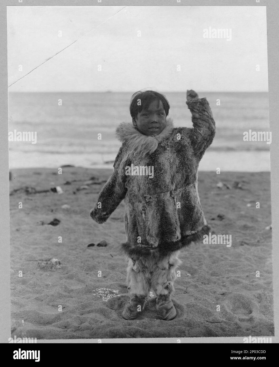 Eskimo child on beach. Frank and Frances Carpenter collection , Gift ...