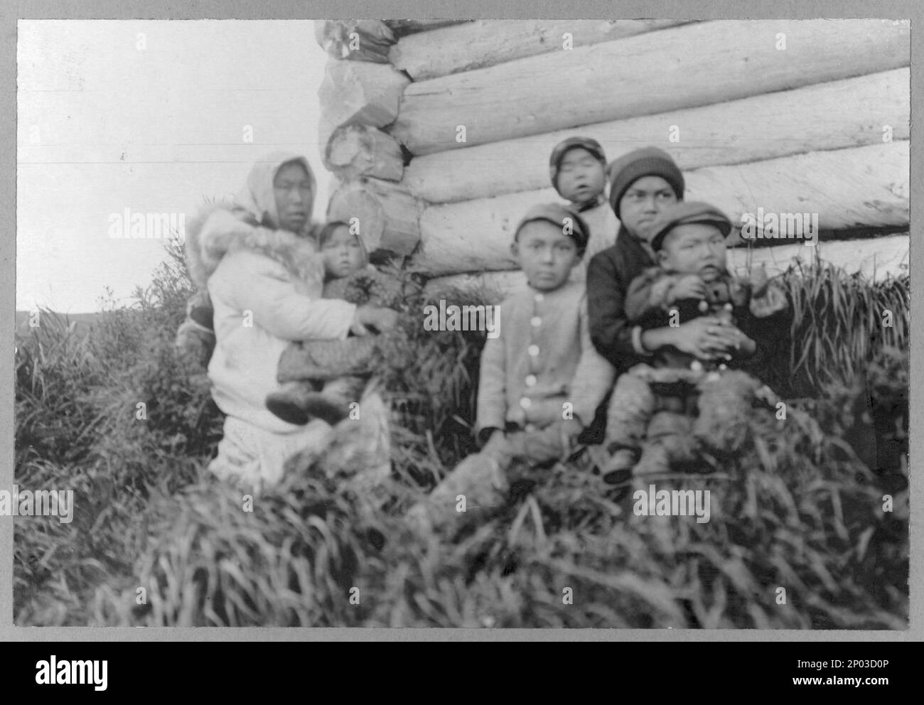 Eskimo woman with children. Frank and Frances Carpenter collection ...